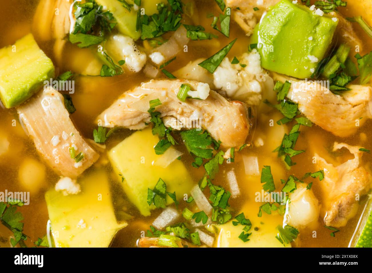 Homemade Mexican Chicken Pozole Soup with Tortilla Chips Stock Photo ...