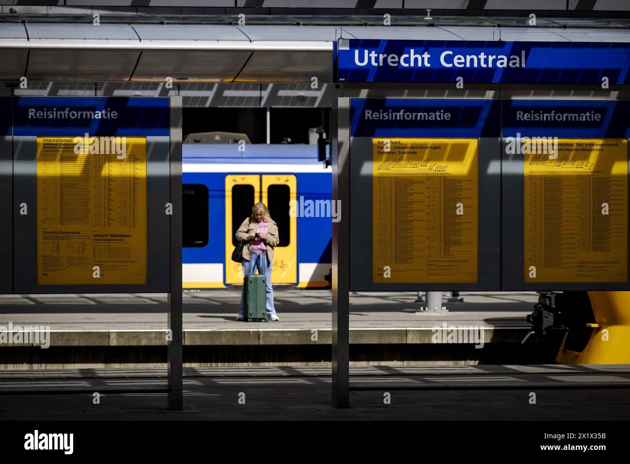 UTRECHT - A Dutch Railways train arrives at the platform of Utrecht ...