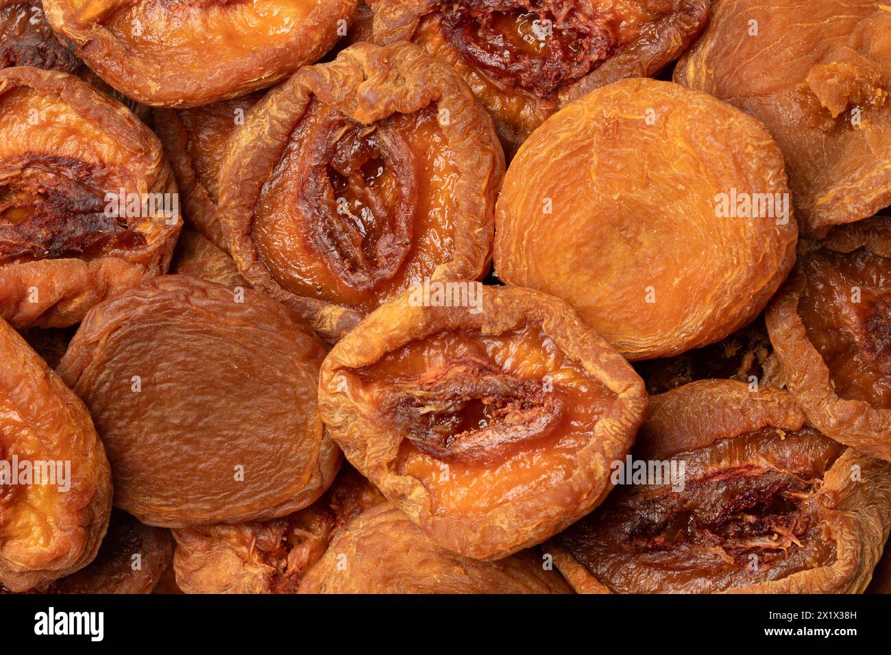 Dried preserved peach fruit close up full frame as background Stock ...
