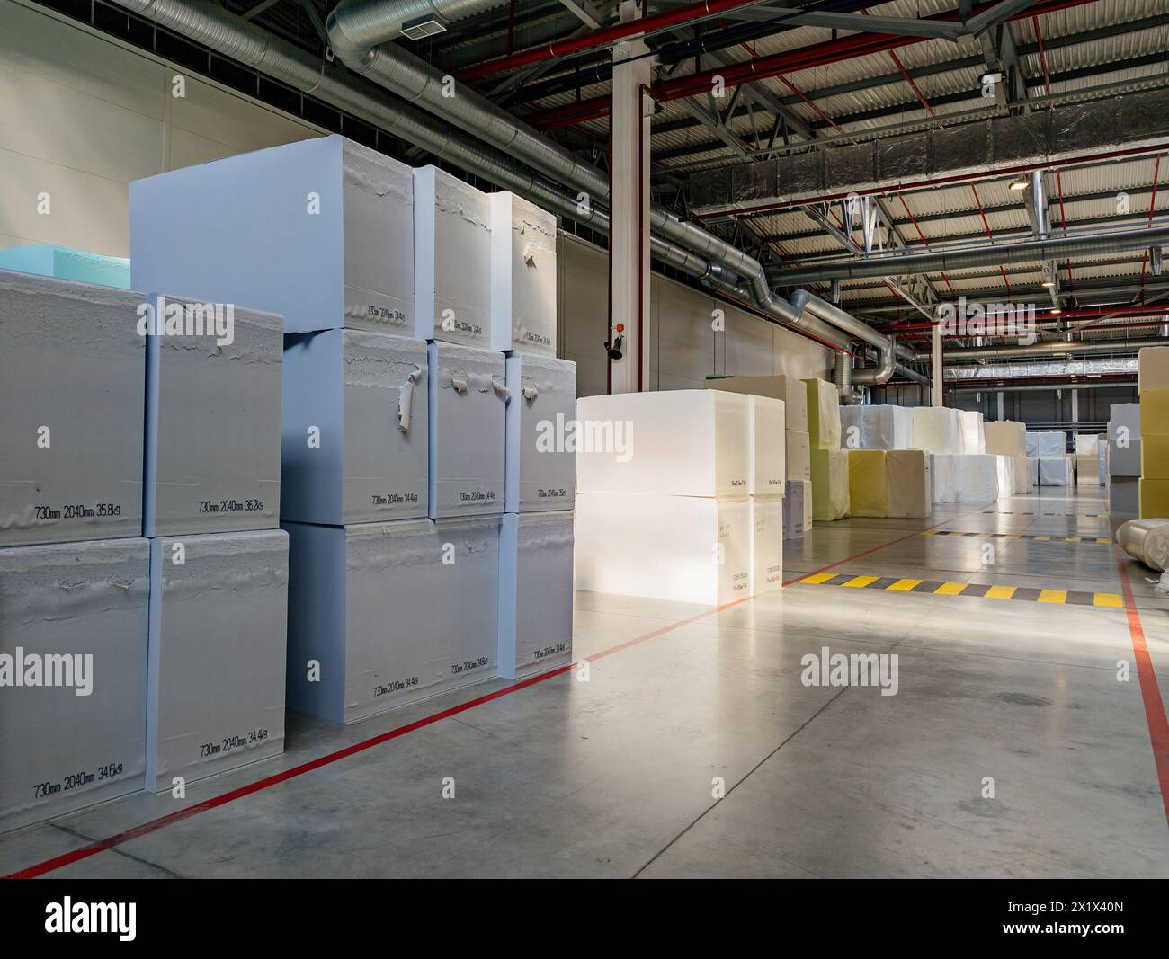 Blocks of foam rubber in warehouse Stock Photo - Alamy