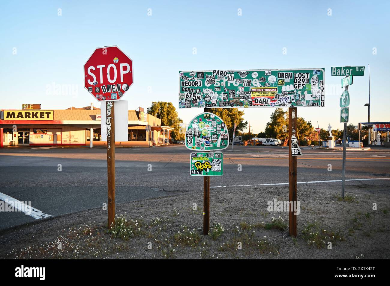 BAKER, CALIFORNIA - 14 APR 2024: Signs covered with stickers at the I ...