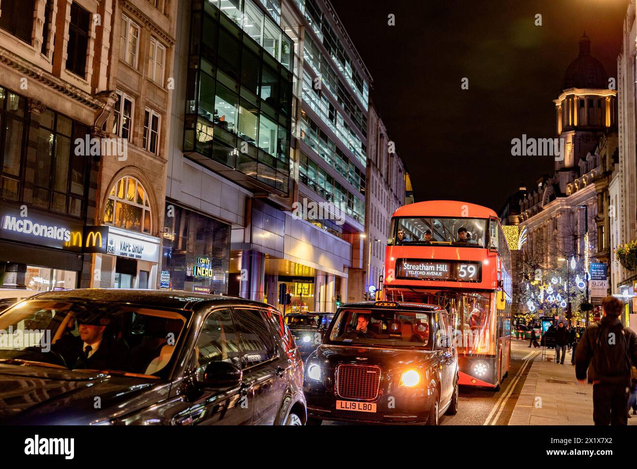 London TfL buses at nighttime - England, United Kingdom Stock Photo - Alamy