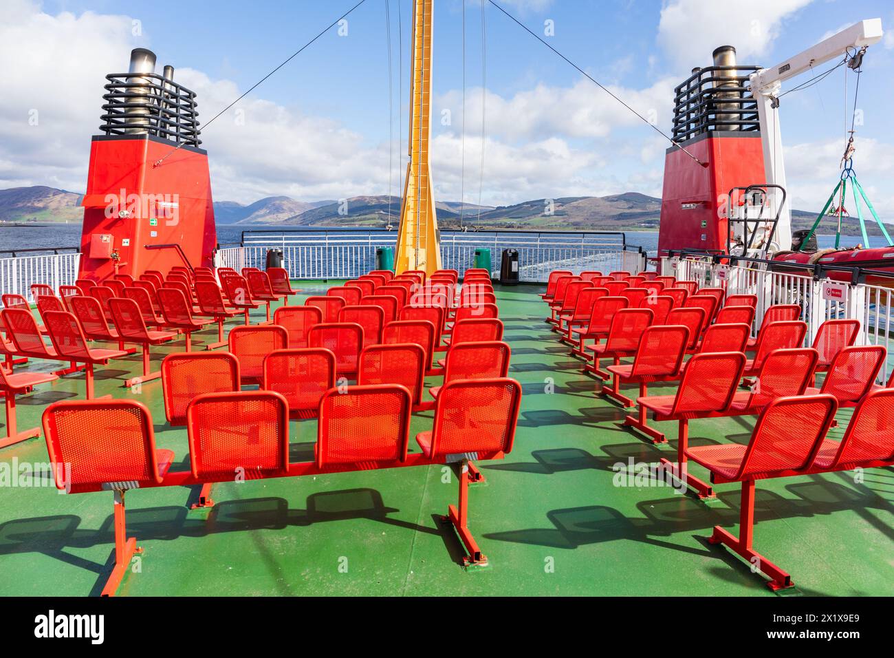 Red seating on the observation deck of the Caledonian MacBrayne MV ...