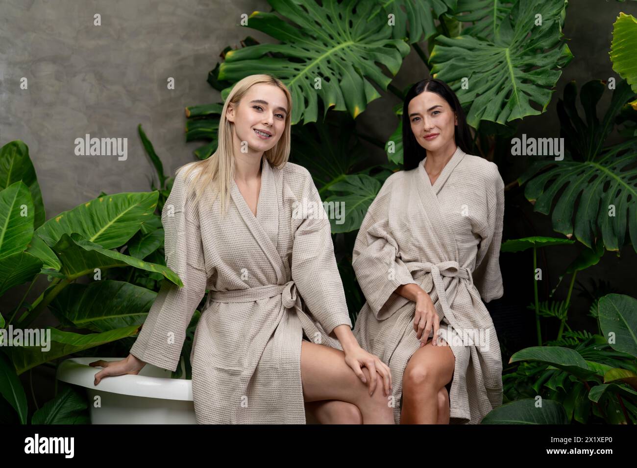Two women in bathtub hi-res stock photography and images - Alamy