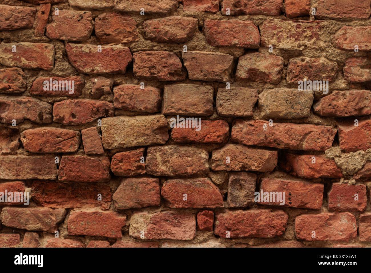 Old worn brick wall in Siena, Italy Stock Photo - Alamy