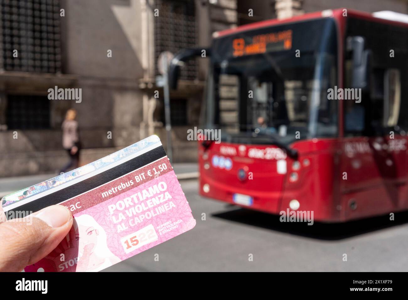 An ATAC metro and bus ticket photographed in front of a bus in Rome ...