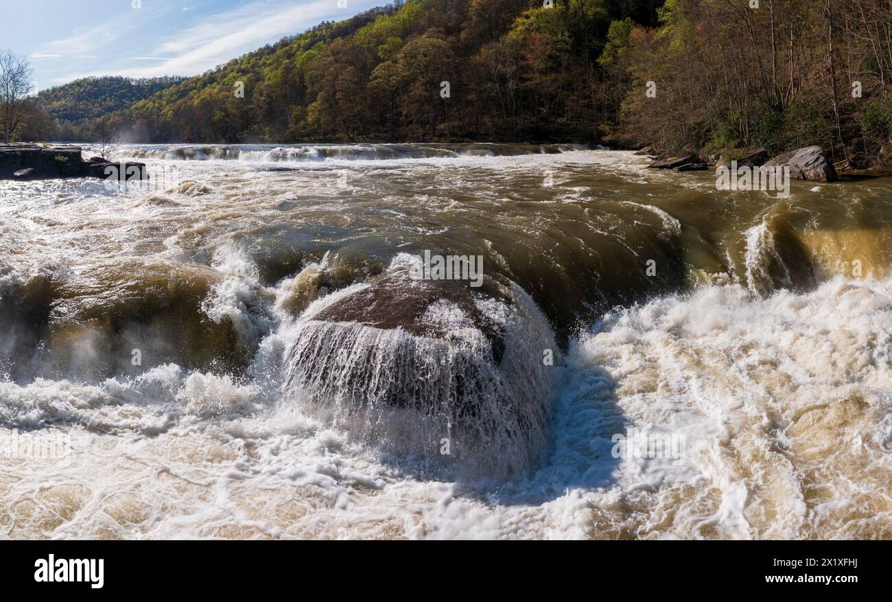 Aerial eye level view of raging water in Tygart river at Valley Falls ...