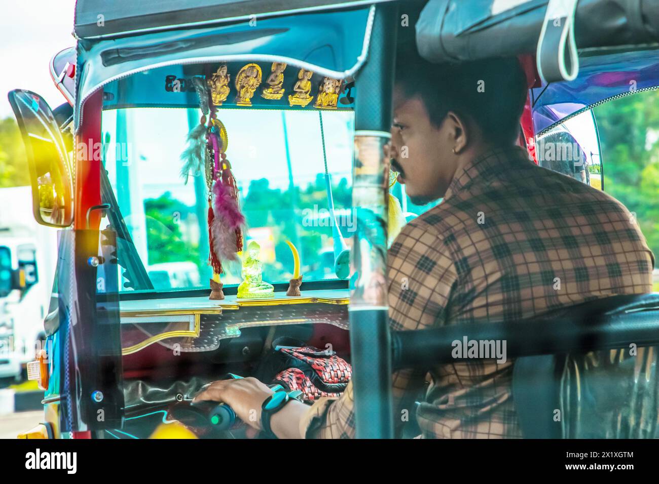 Back of Asian man driver wearing while driving motor tricycle tuk tuk ...