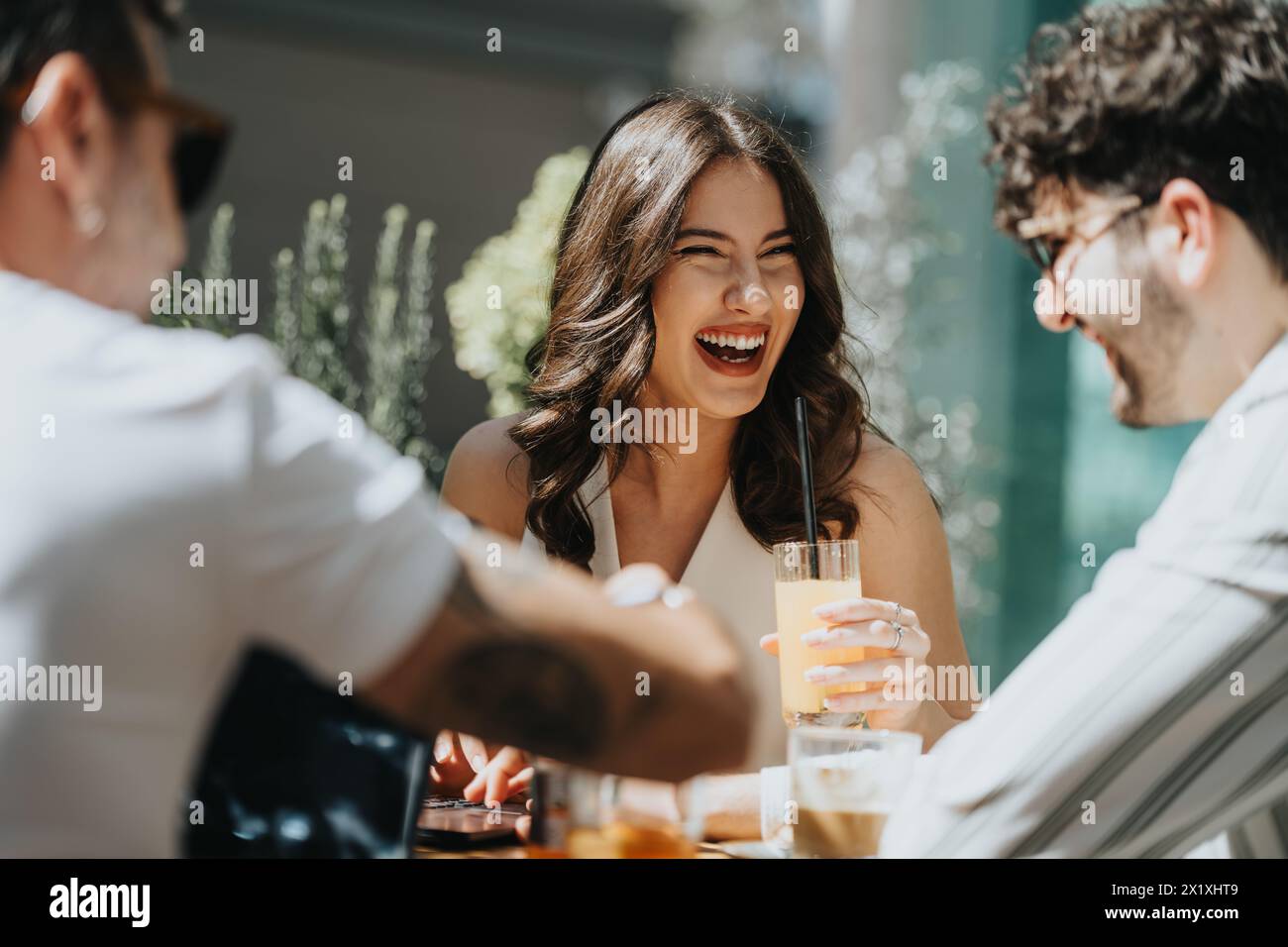 Multi generational entrepreneurs laughing while brainstorming at a ...