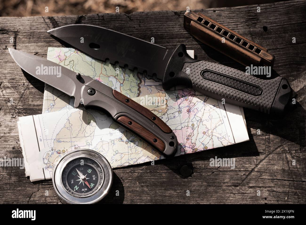 Camping kit for hiking in the wild, knife, map and compass with ...