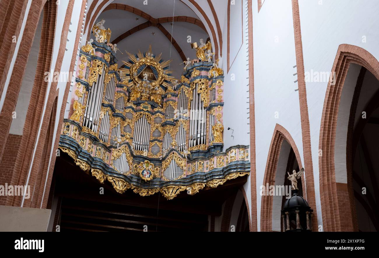 Large ornate gold accented pipe organ in the interior of St. Elizabeths ...
