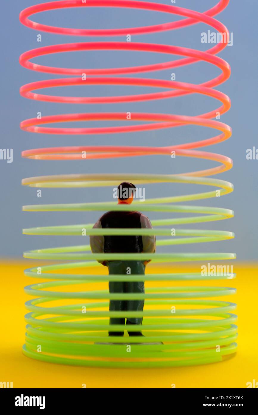 Figure of man from back isolated inside cylindrical structure (plastic ...