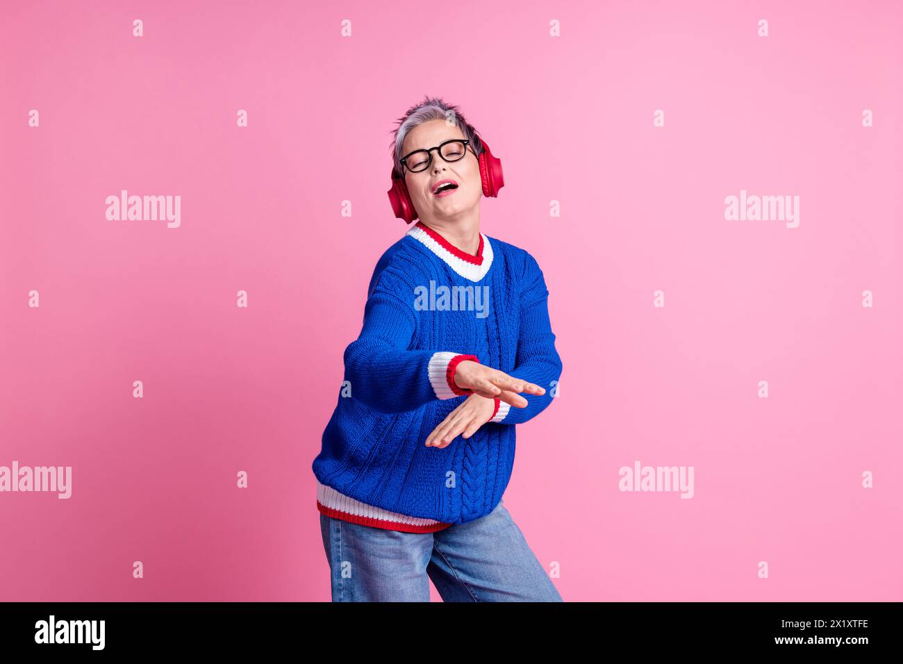 Photo of funky old woman wear headphones listen songs dance isolated ...