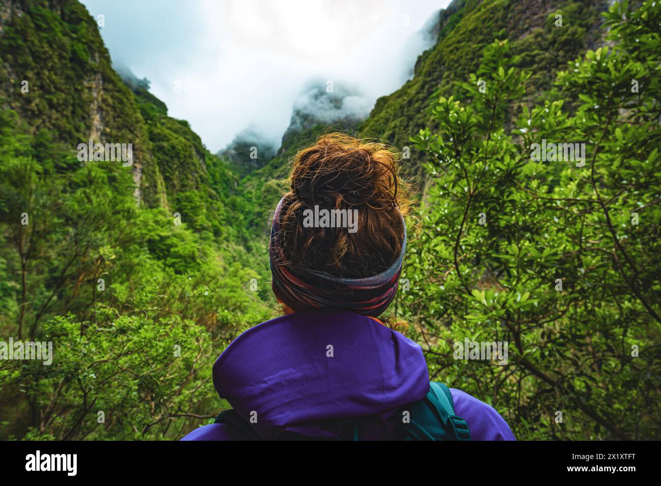 Description: Backpacker tourist enjoys mystic view from water canal ...