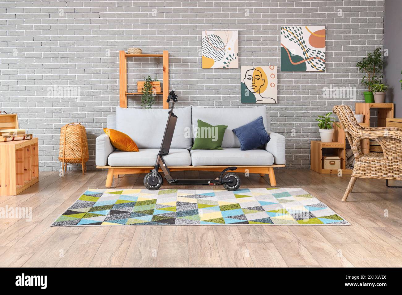 Interior of modern living room with electric scooter and sofa Stock ...