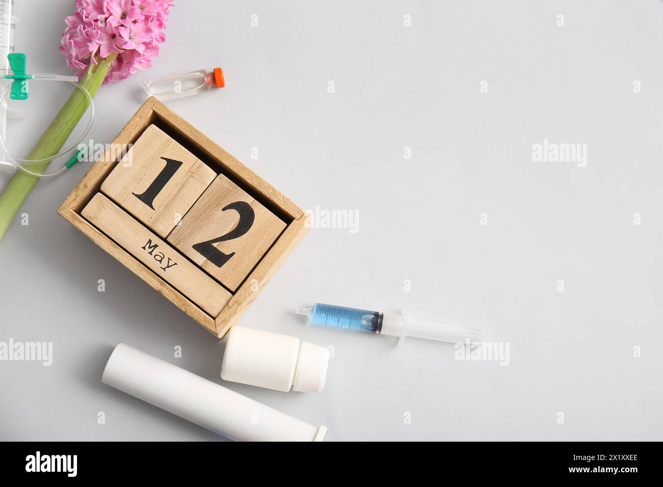Calendar with syringe, ampule and flower for International Nurses Day ...