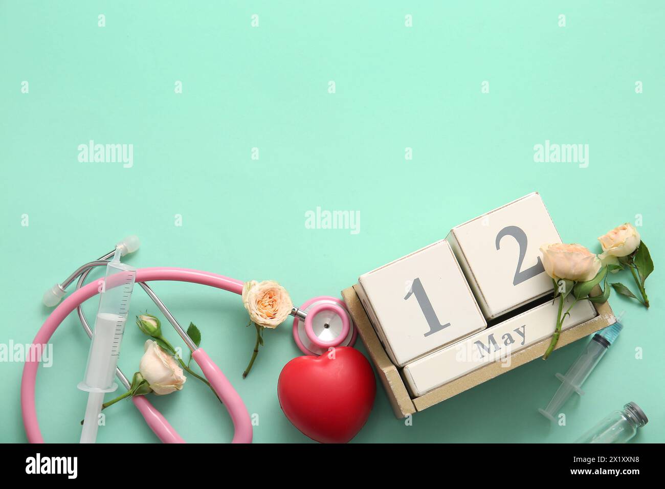 Stethoscope with calendar, syringes and roses for International Nurses ...