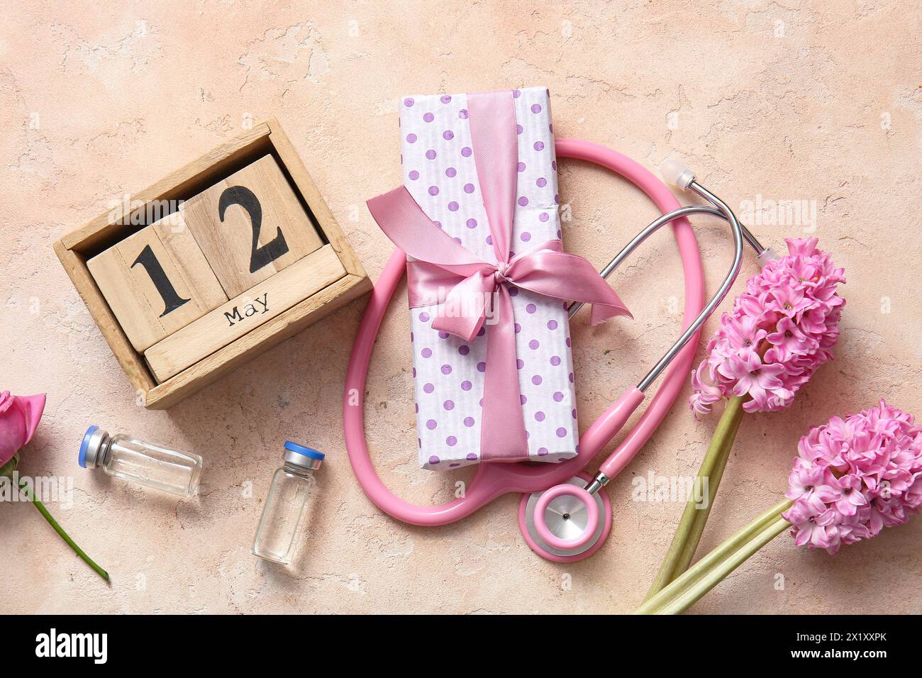 Stethoscope with calendar, gift box and flowers for International ...