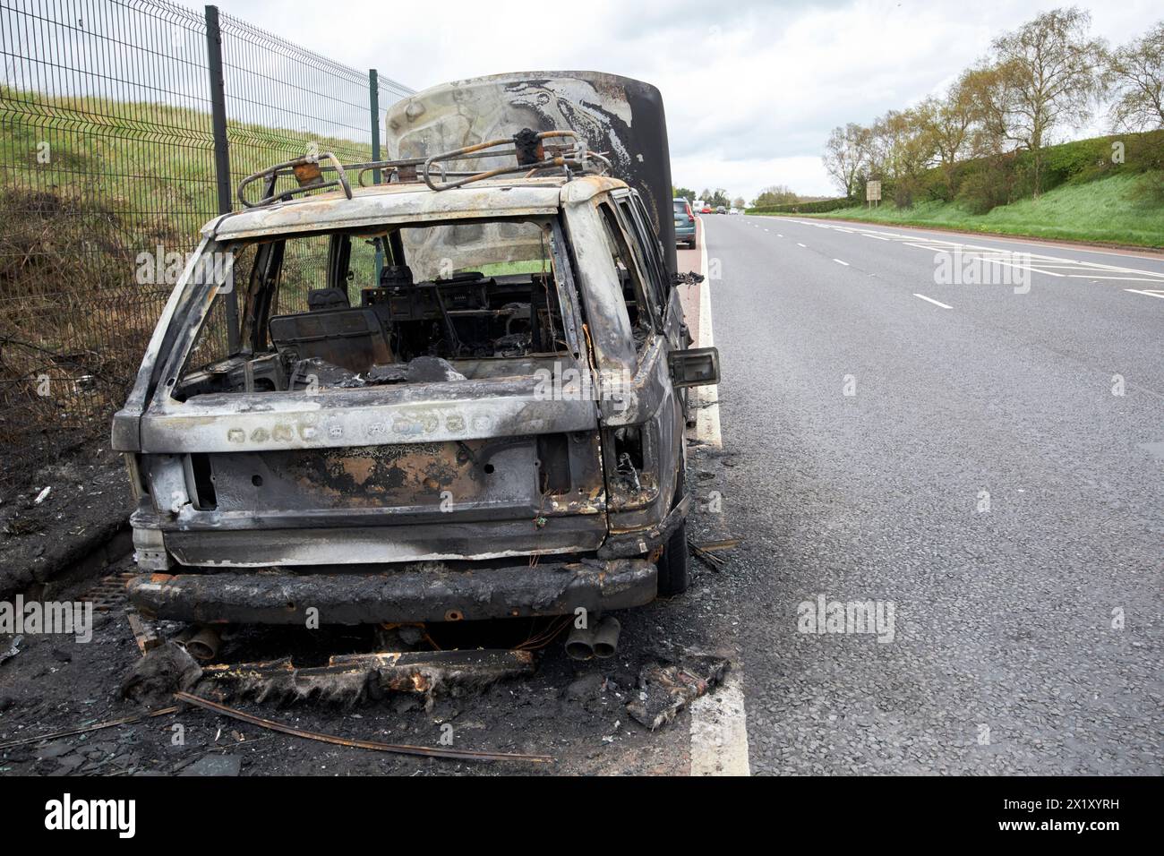 burnt out range rover by the side of the road in county antrim northern ...
