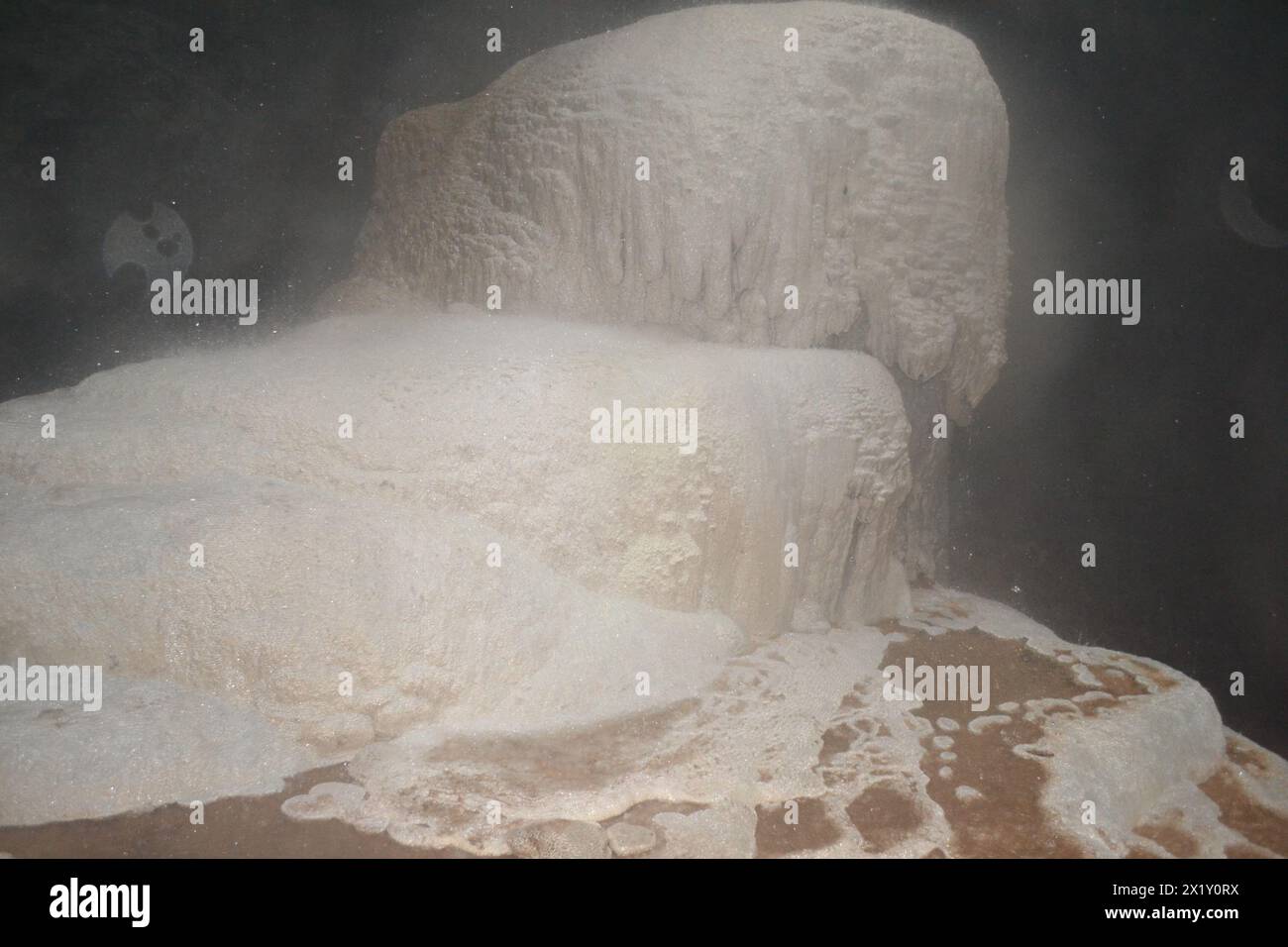 The large white crystal-like rock in the Grubug vertical cave looks ...