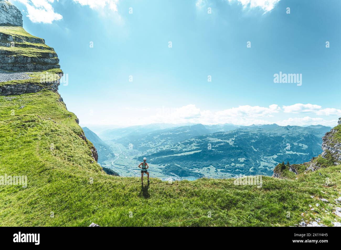 Description: Athletic woman enjoys amazing view from Churfürsten hike ...