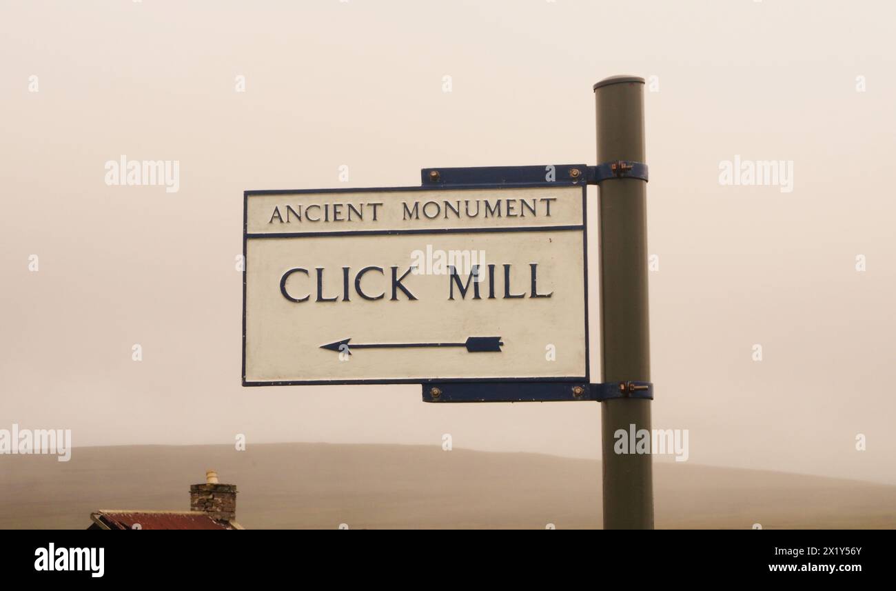 Signpost to the ancient monument, of the Dounby Click Mill, a ...
