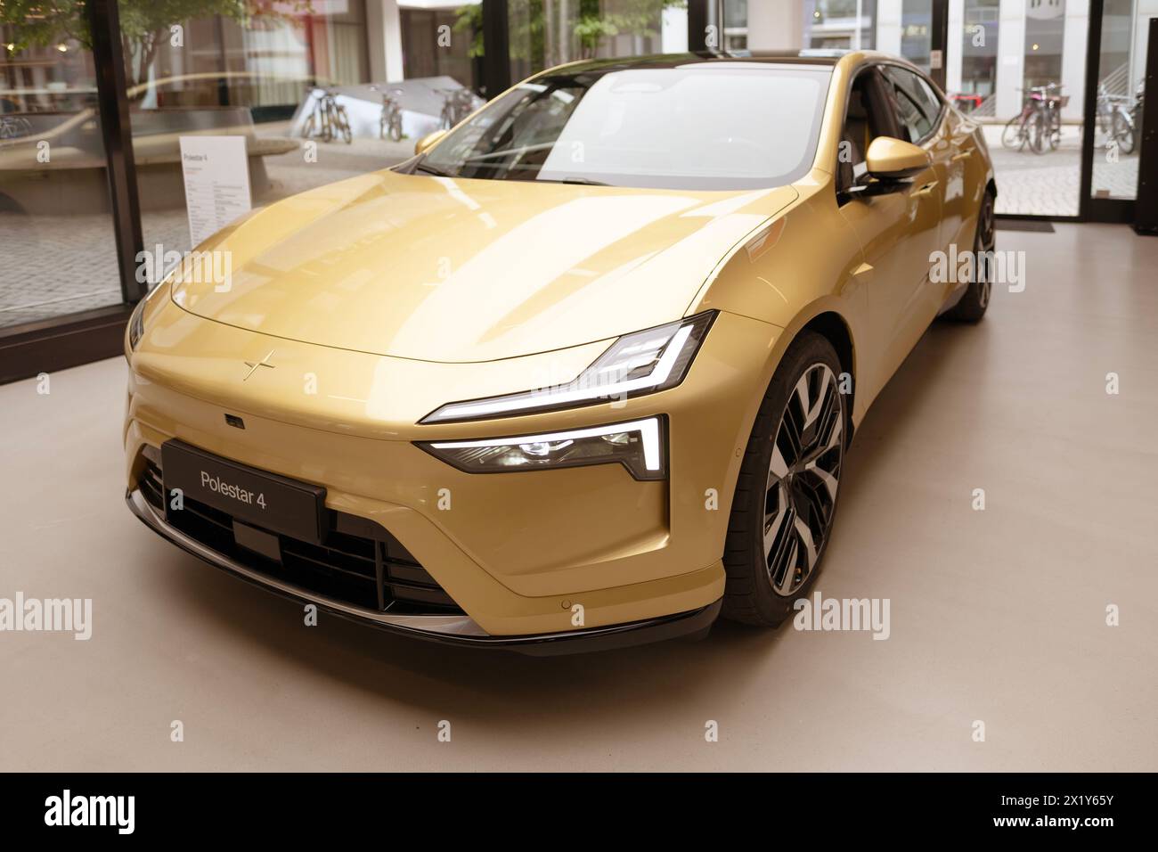 Shiny golden car Polestar 4 upcoming all-electric SUV coupe by Polestar ...