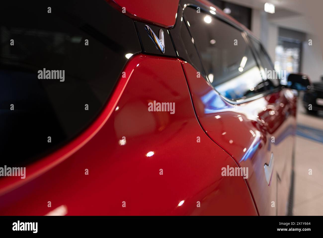 new red Vinfast vf 9 electric SUV in Studio, advanced technologies in ...