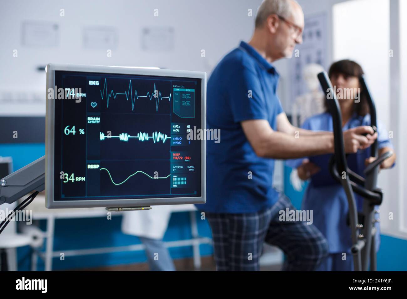 Close-up of heart rate monitor taking a pulse of senior patient during ...
