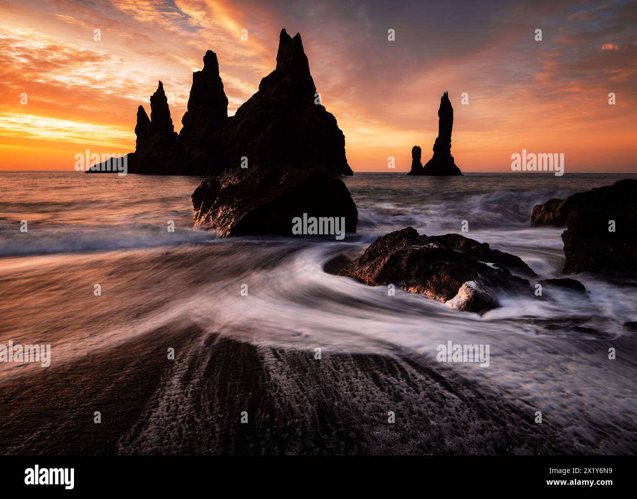 Sunrise on black sand hi-res stock photography and images - Alamy