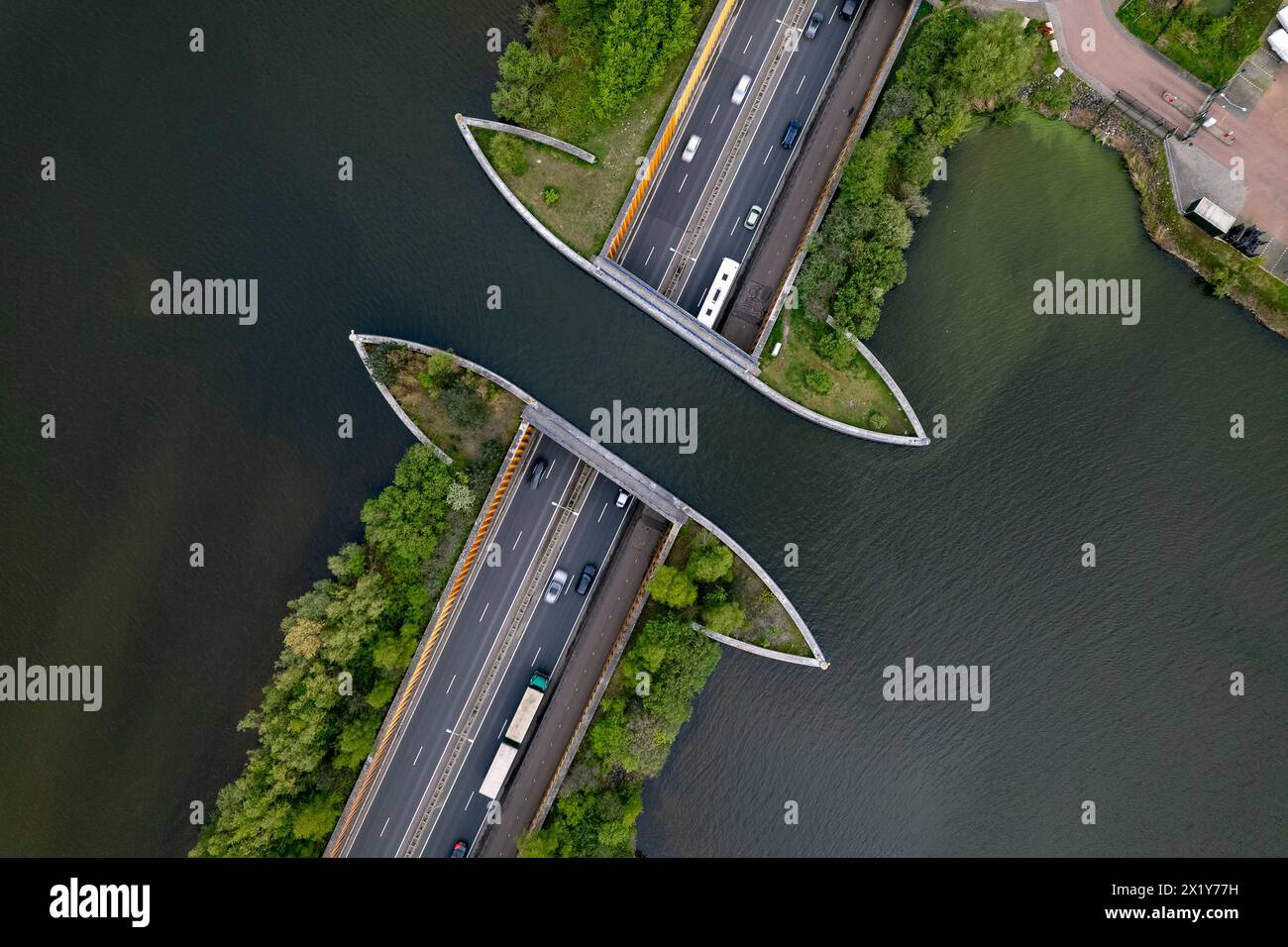 Highway with traffic passing underneath Veluwemeer aquaduct seen from ...