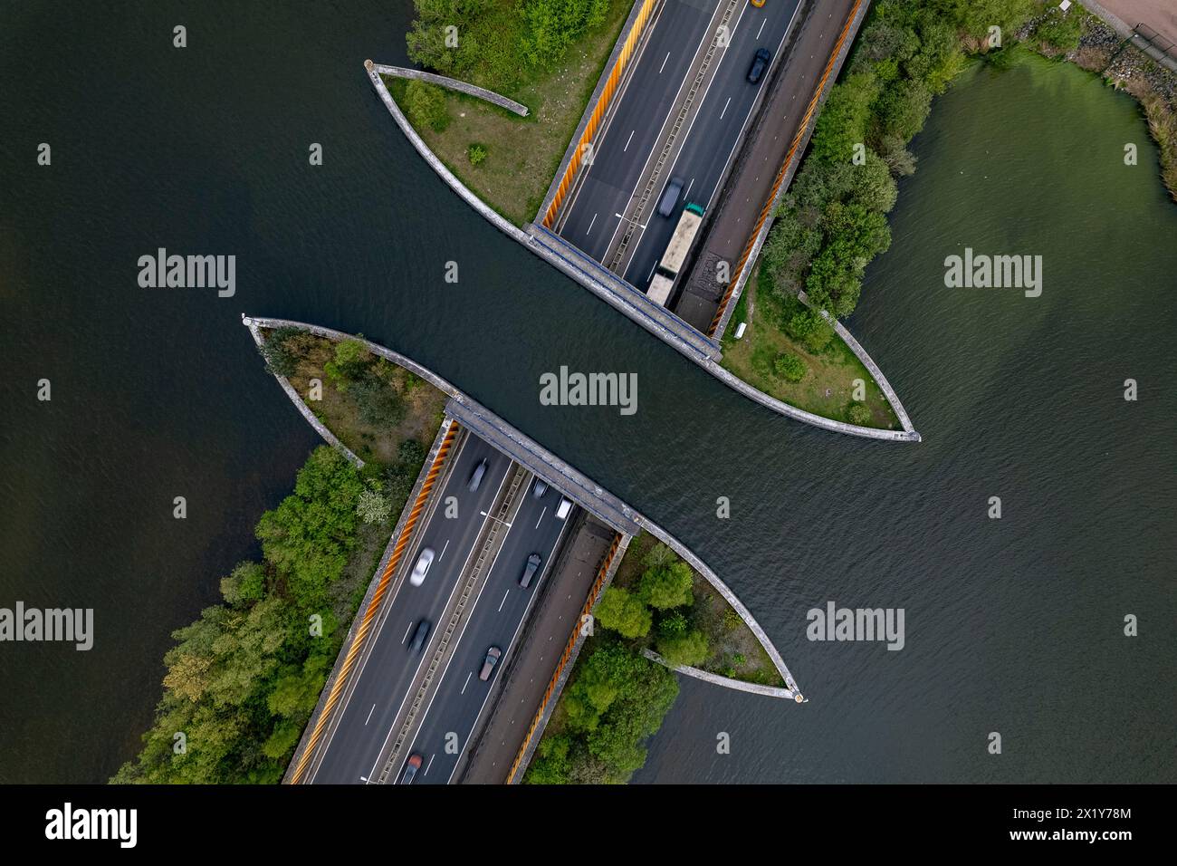 Highway with traffic passing underneath Veluwemeer aquaduct seen from ...