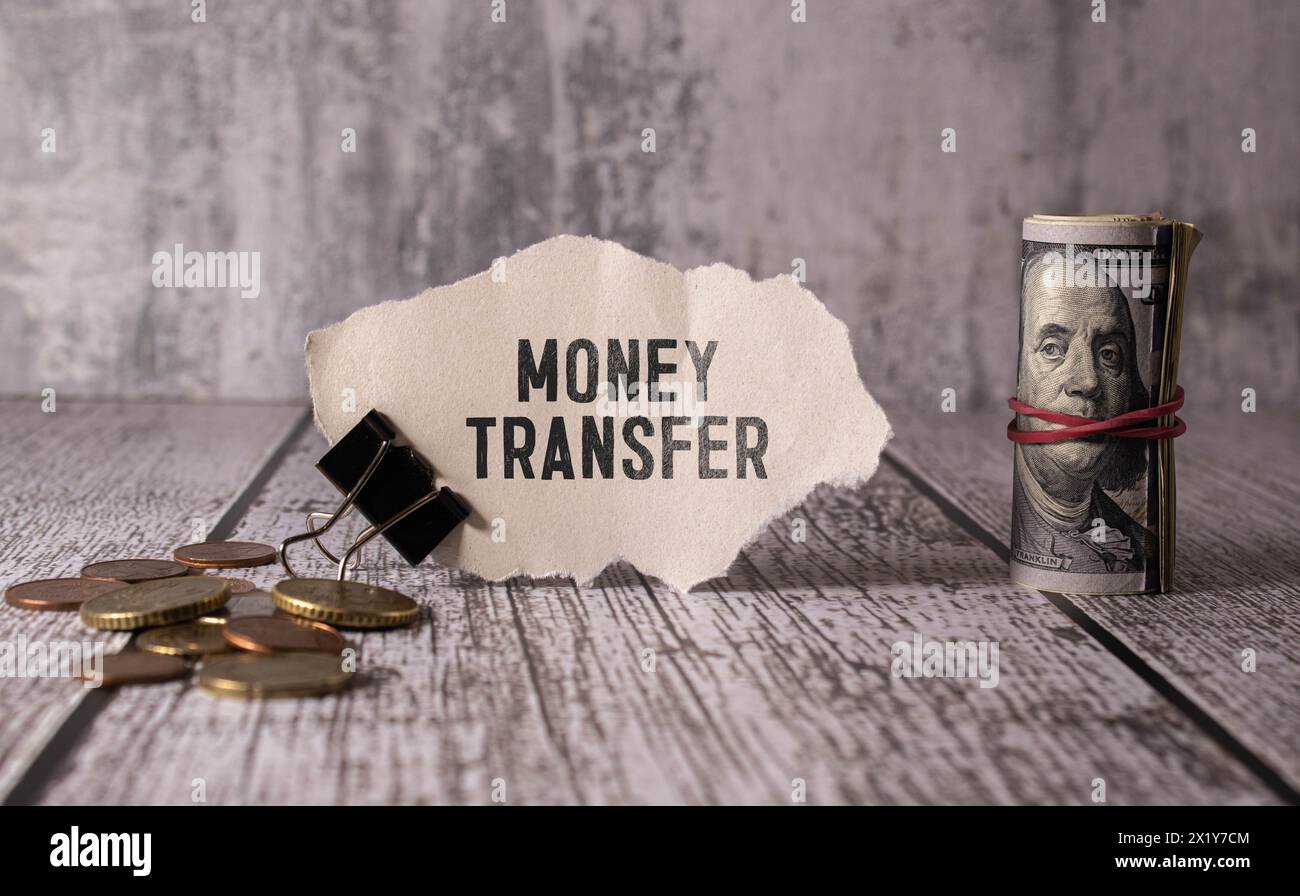Hand writing the text: Money Transfer Stock Photo - Alamy