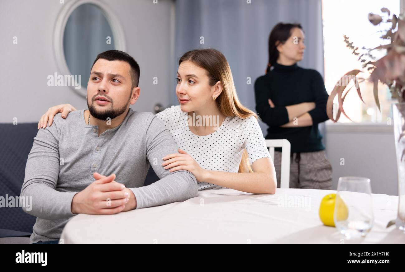 Friend comforting sorrowful young hi-res stock photography and images ...