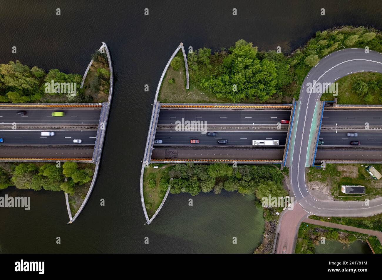 Highway with traffic passing underneath Veluwemeer aquaduct seen from ...