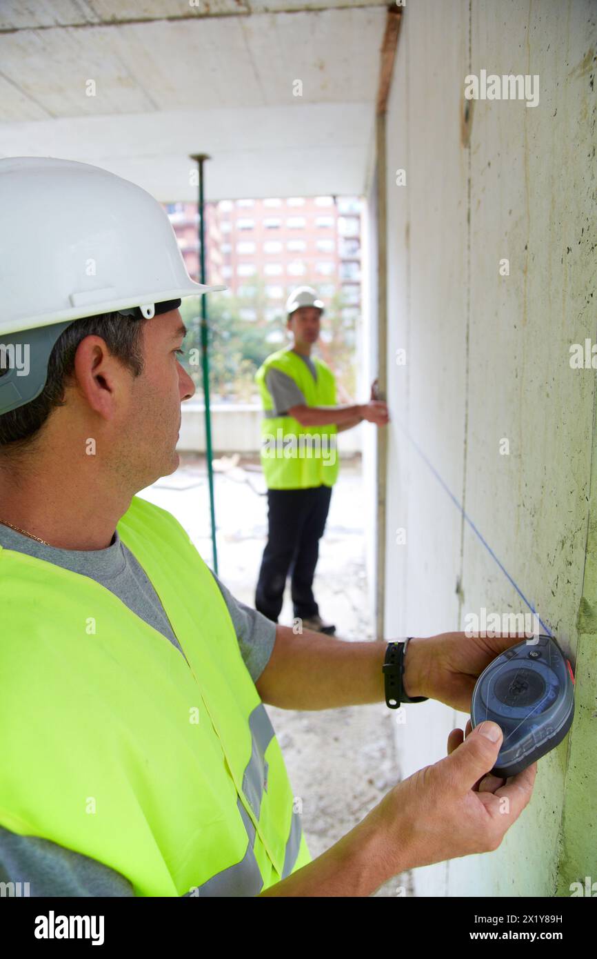 Workers with personal protective equipment, PPE, Marking guide lines ...