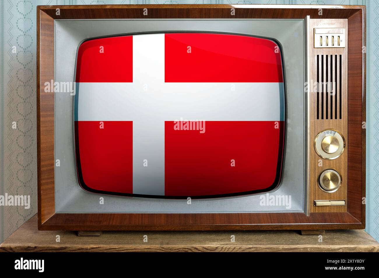 old tube vintage TV with the national flag of Denmark on the screen ...
