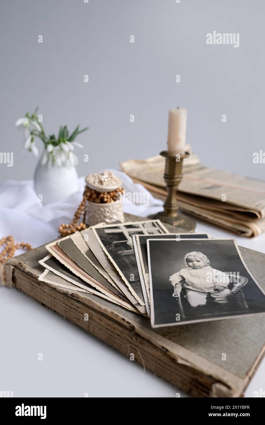 stack of vintage photos, baby photography of 1960, candle is lit, first ...