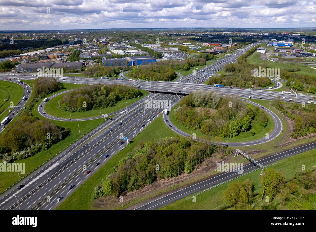 Aerial overview of dramatic clouds above transit roundabout Hoevelaken ...