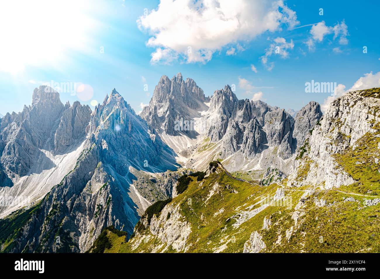 Description: Athletic woman walks on super epic view point with Cadini ...