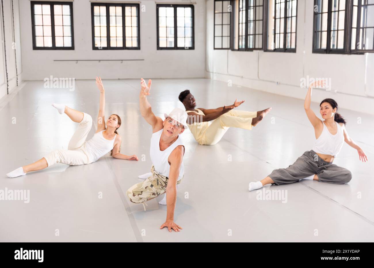Dancers on stage, choreography with elements of theatrical production ...