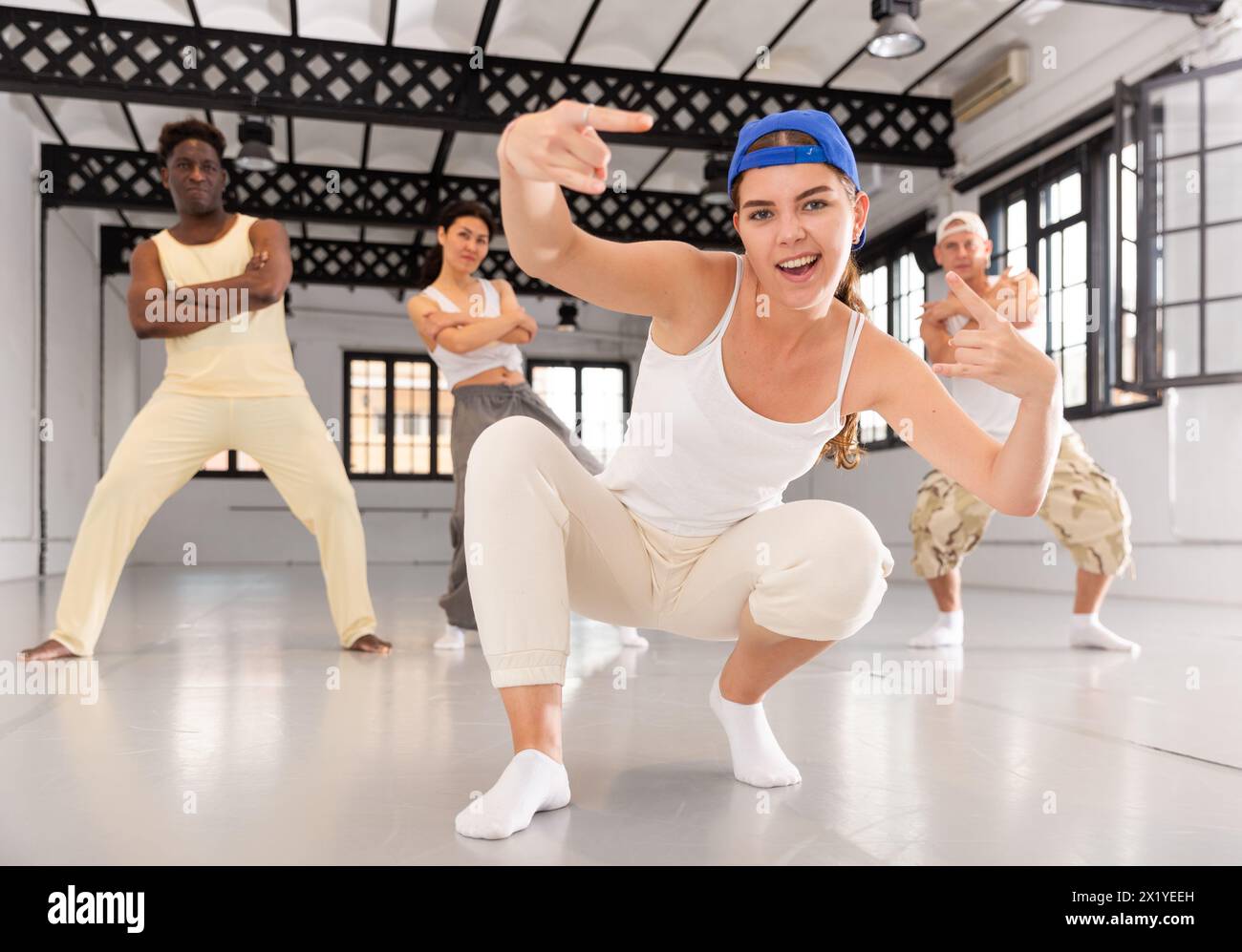 Team of dancers performing hip-hop dance Stock Photo - Alamy