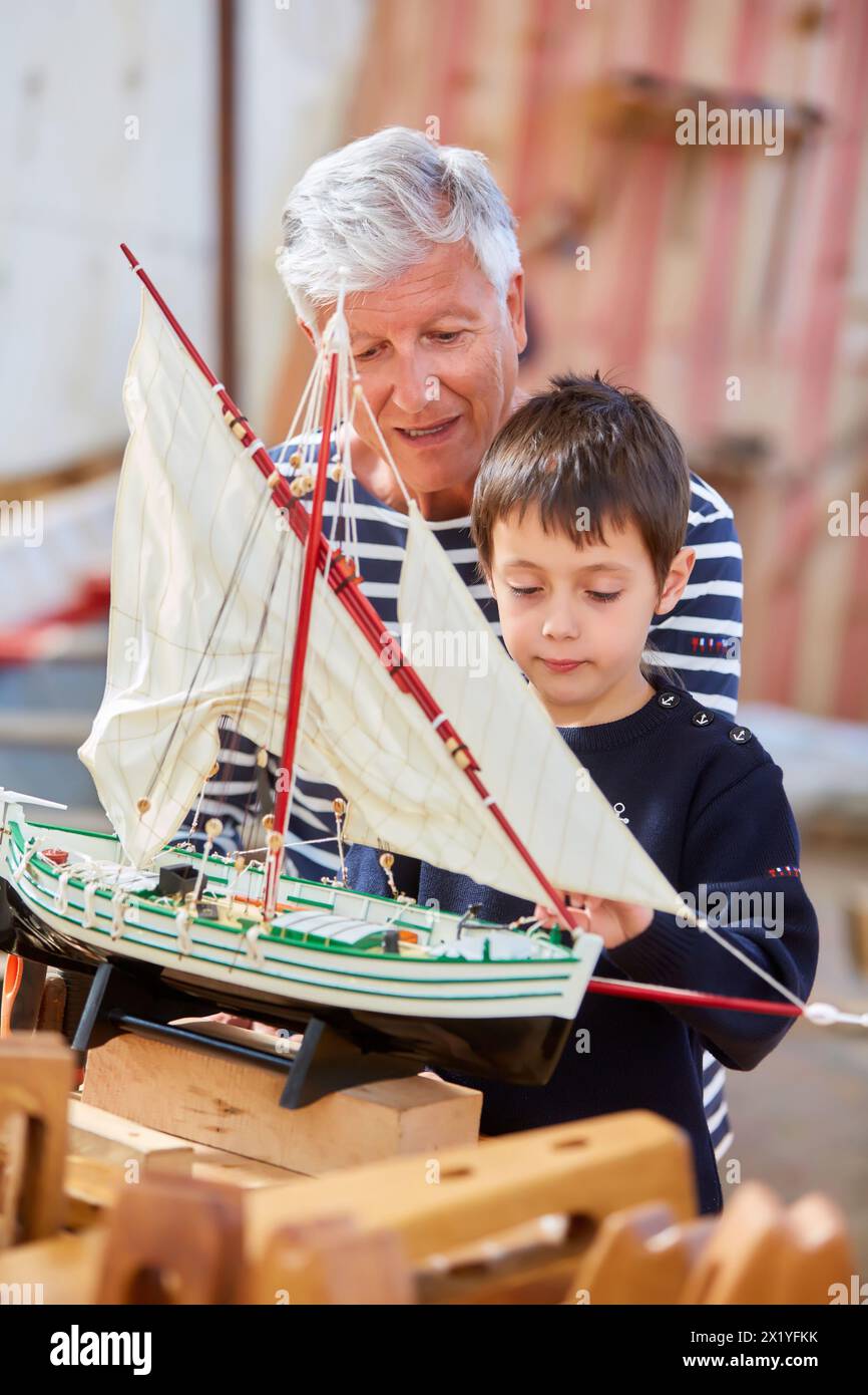 Grandfather and grandson, Building model sailboat, Whaleship, Pasaia ...