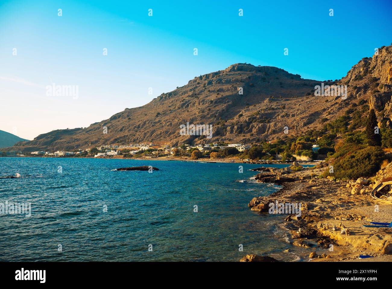 Pefki beach with houses on the island of Rhodes Stock Photo - Alamy