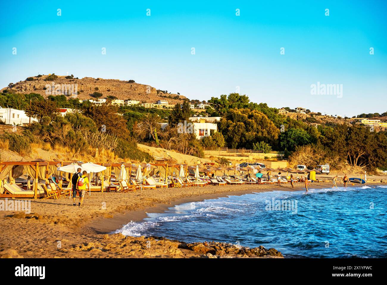 Plakia Beach with houses on the island of Rhodes Stock Photo - Alamy