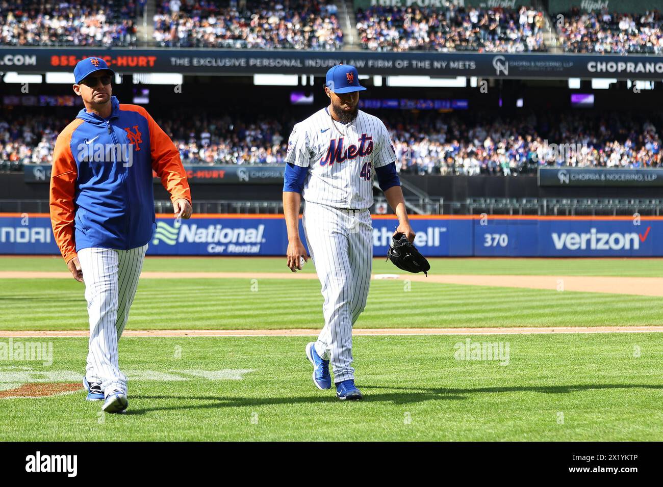 New York Mets relief pitcher Yohan Ramírez #46 comes off field with ...