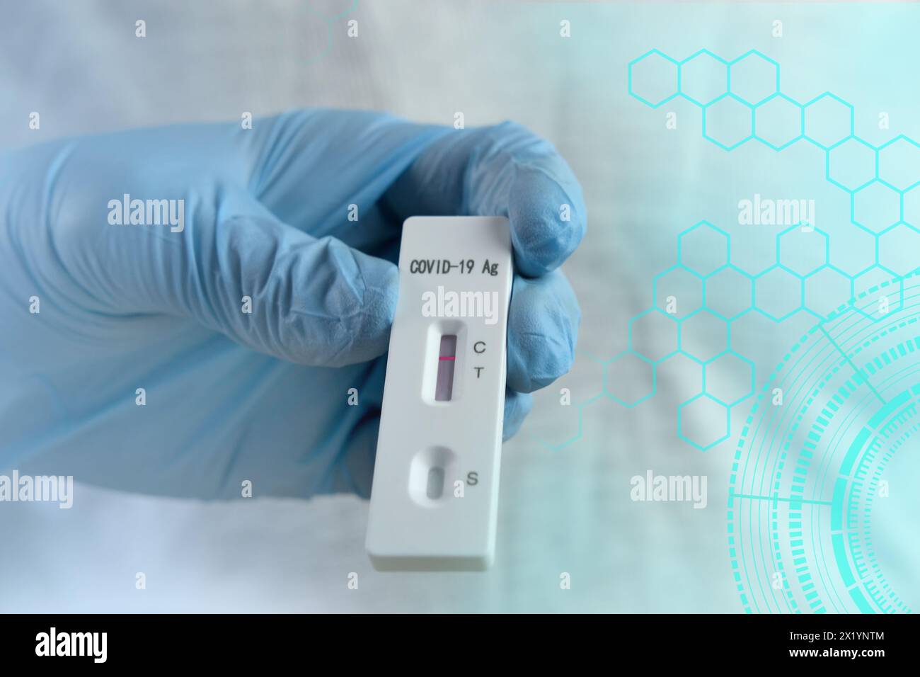 closeup male hand holding test cassette, medical disposable sterile ...