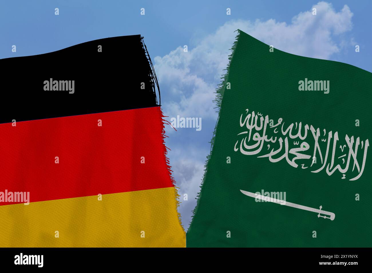 two torn flags Germany and kingdom of saudi arabia with an Arabic ...