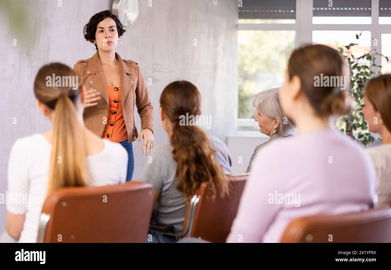 Female teacher is giving lecture for students in university class Stock ...