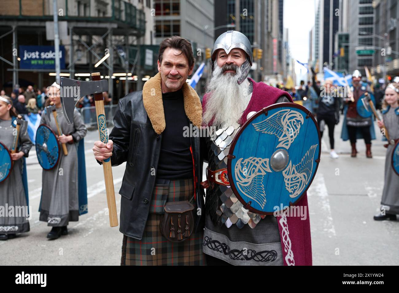 A member of Harald Olafsson Vikings poses for a photo with Grand ...